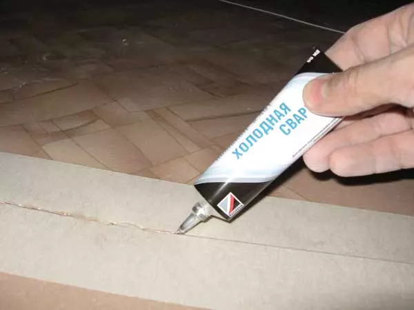 How to close a hole in linoleum: with a patch and without fling