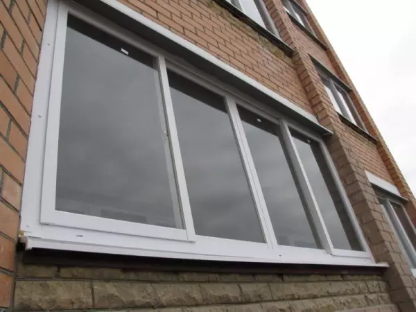 parallel-sliding plastic windows.