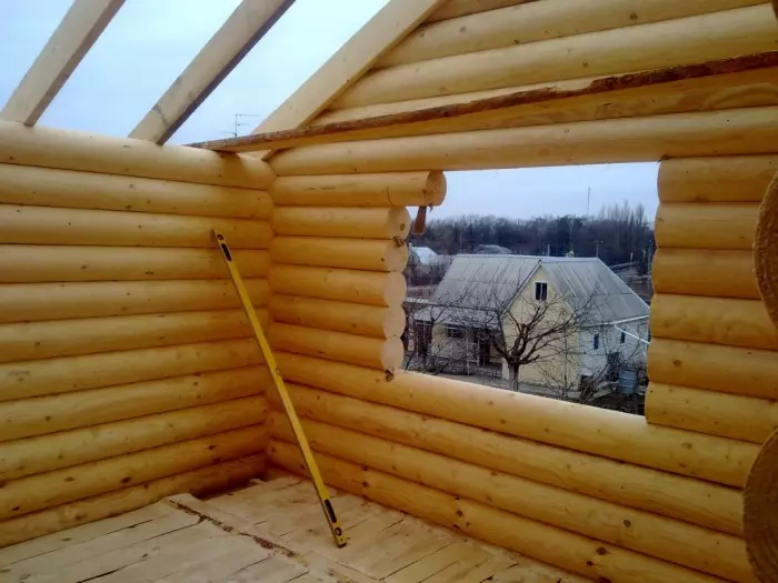 Instalação de janelas de plástico em uma casa de madeira 4441_10