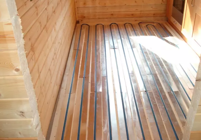 Топло подови во дрвена куќа 4997_5