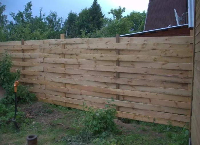 Braided wooden fence from boards 636_6